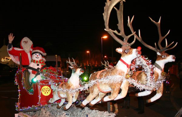 Torchlight Parade lights up Christmas by the sea - The Ambler